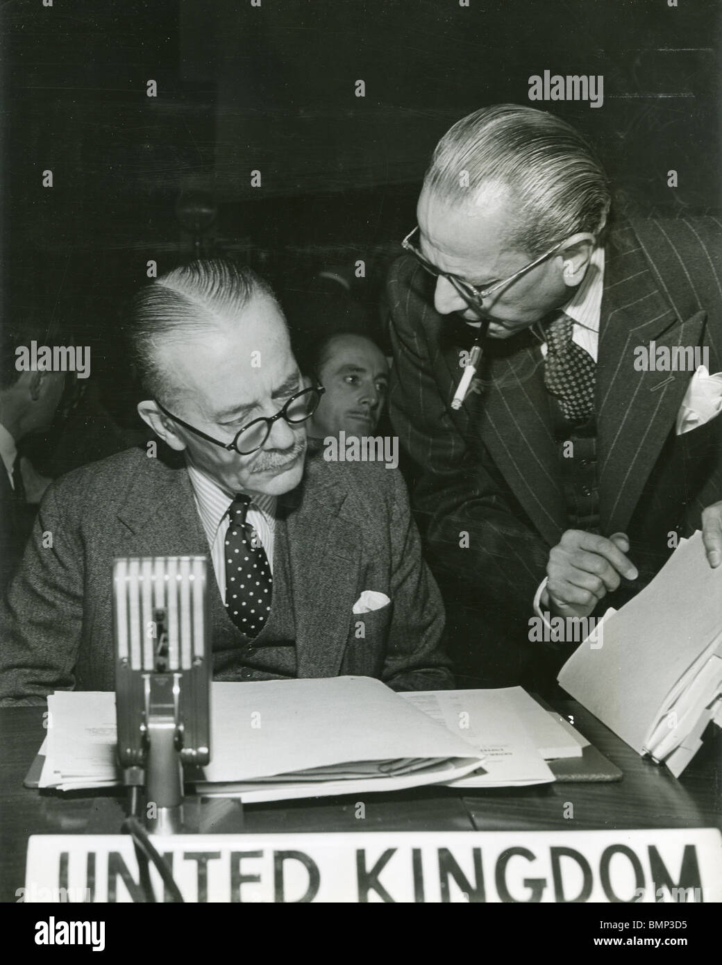 SIR ALEXANDER CADOGAN (sitting) discusses the Palestine issue with Dr ...