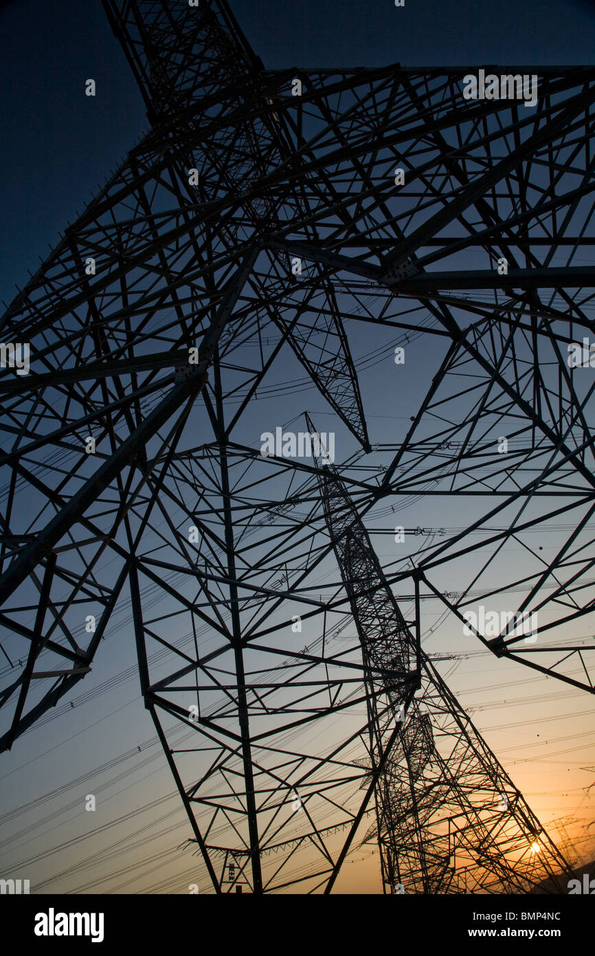 Transmission lines towers tower pylon power line Stock Photo - Alamy