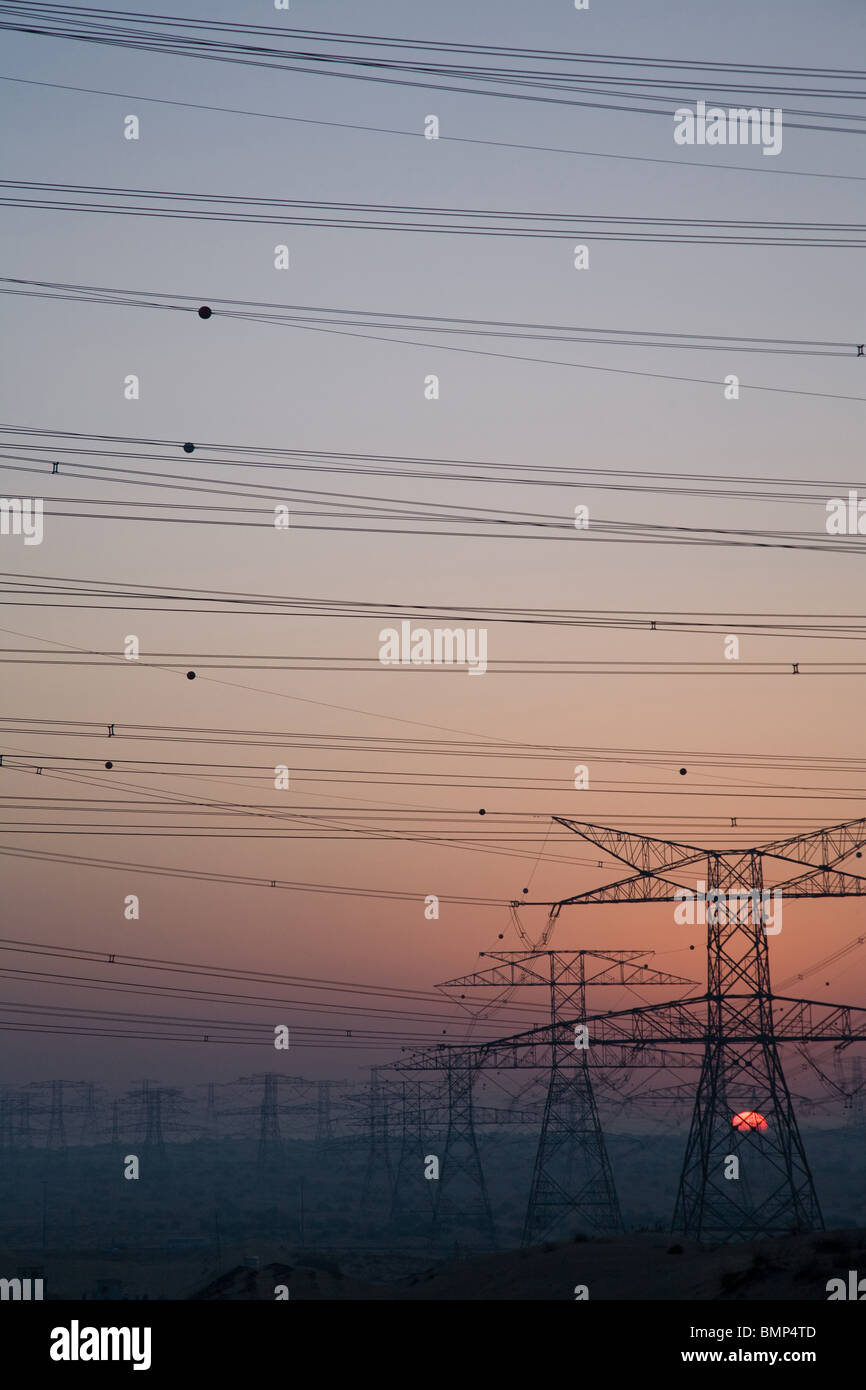 Transmission lines towers tower pylon power line Stock Photo - Alamy