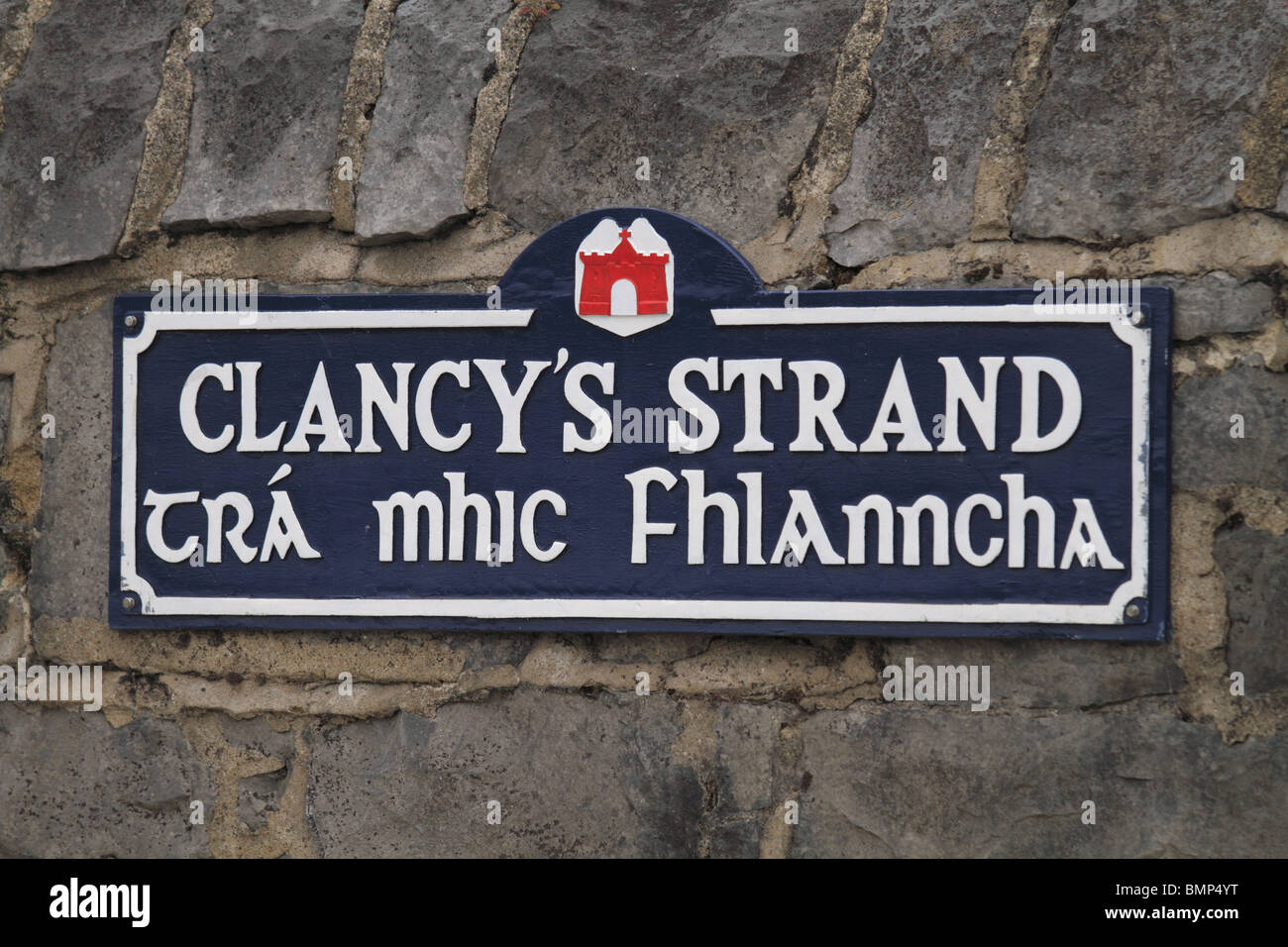 A street name sign, bearing the city crest of Limerick City, Rep of ...