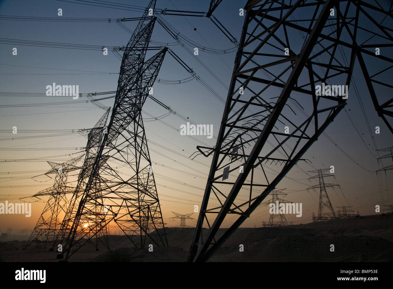 Transmission lines towers tower pylon power line Stock Photo - Alamy