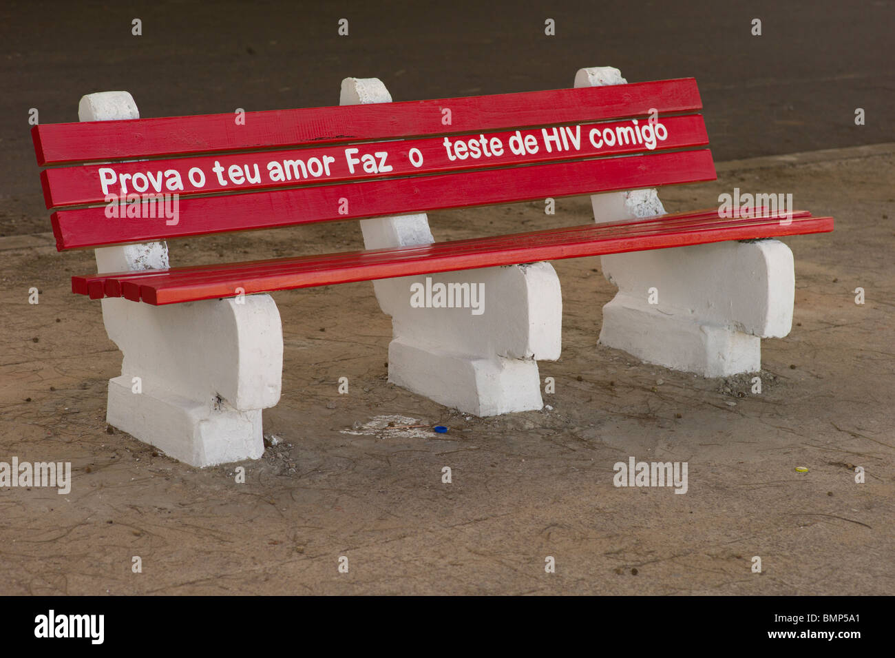 A bench in Maputo, Mozambique, hosting an AIDS prevention slogan ...