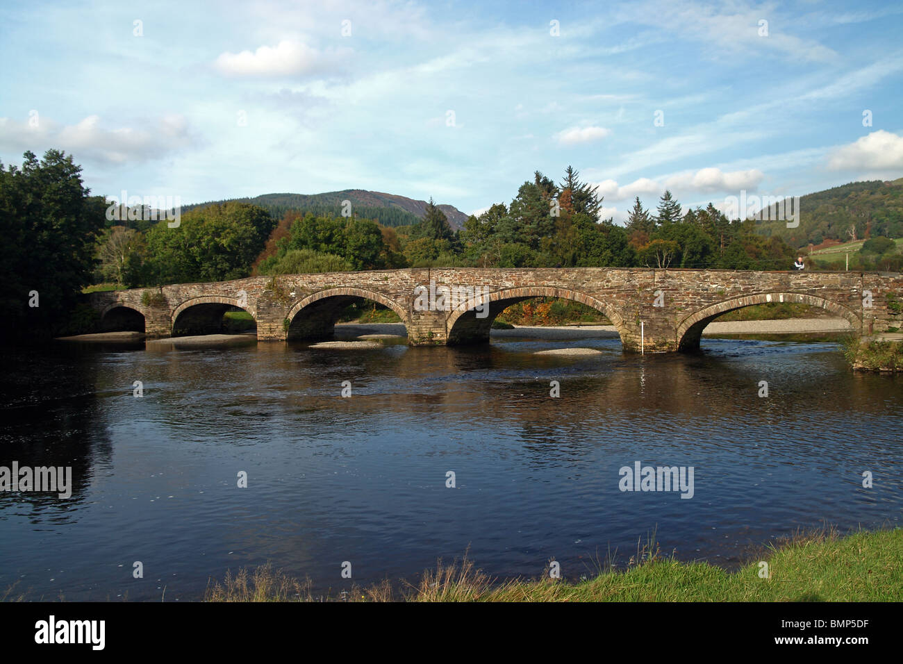 Old stone bridge over the river Mawddach at LLanelltyd, Gwynedd, Wales ...