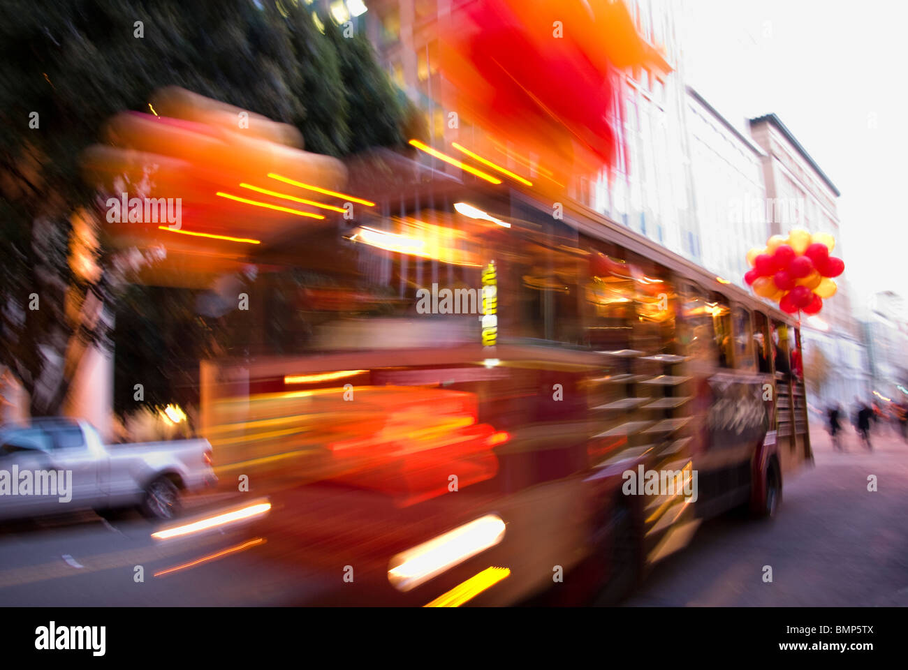 Chinese New Year motorized cable car with balloons joins the parade ...