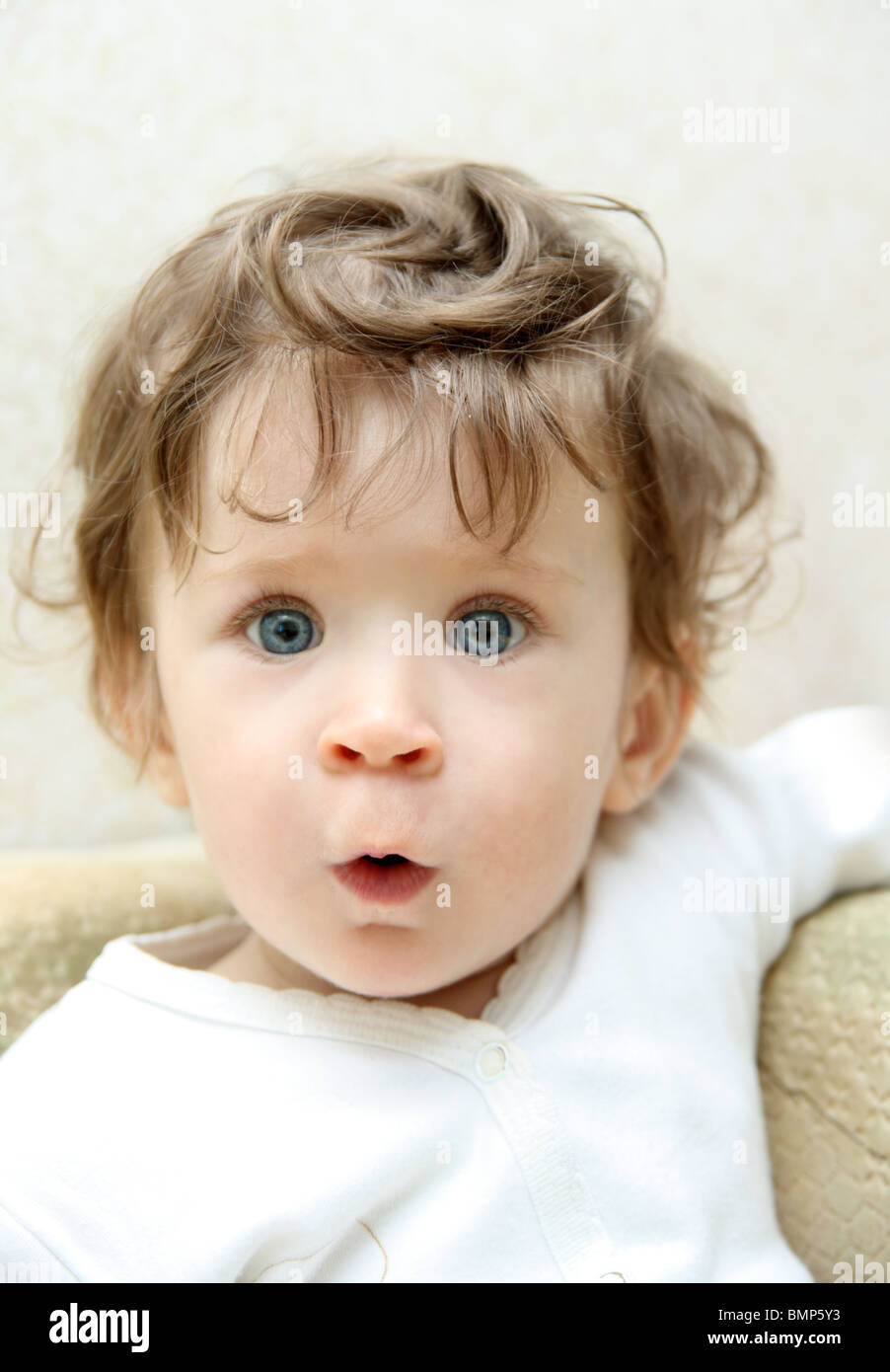 fun surprised baby looking to you portrait Stock Photo - Alamy