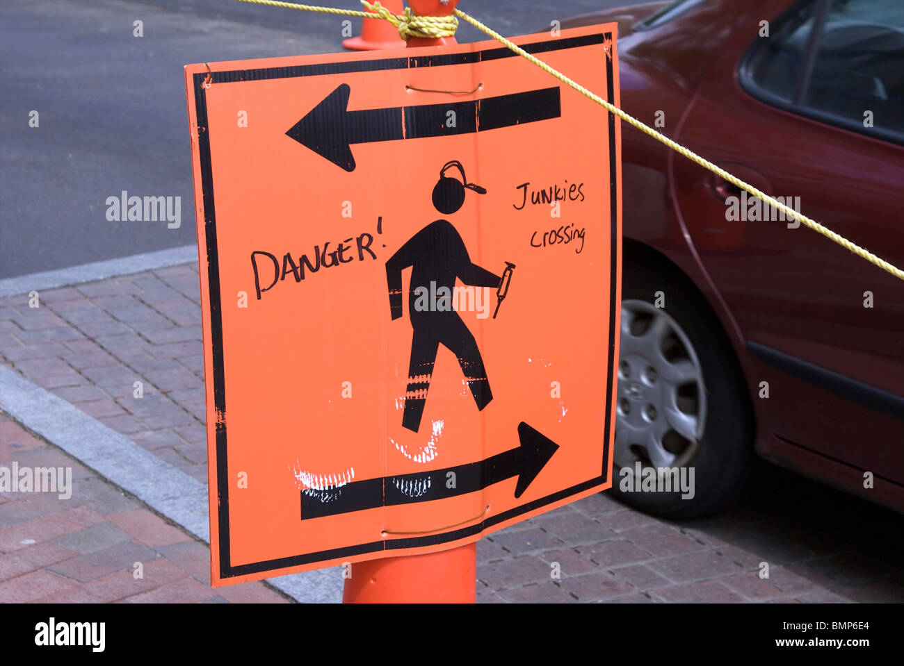 Orange pedestrian crossing sign hi-res stock photography and images - Alamy