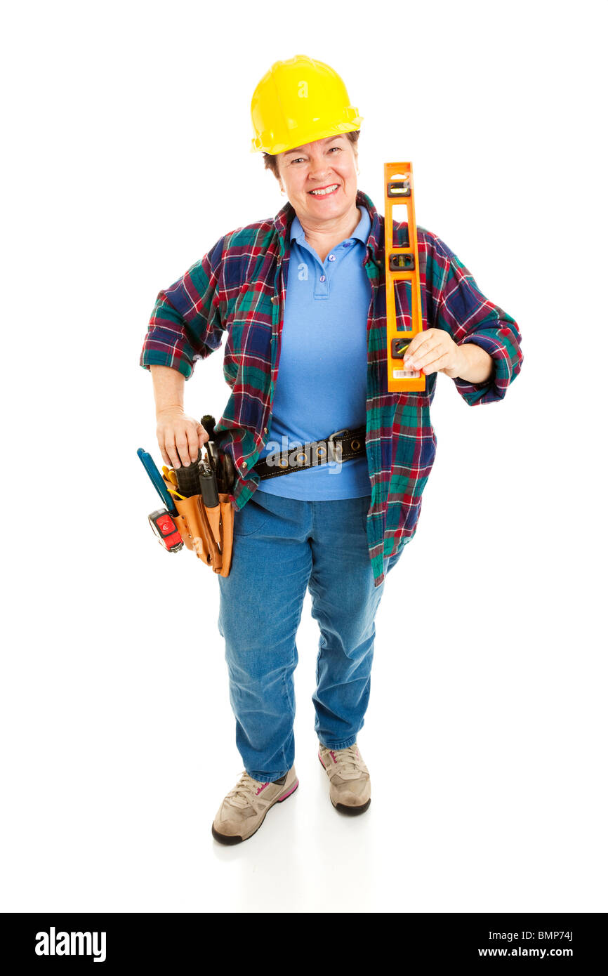 Friendly female construction worker with tools. Full body isolated on ...