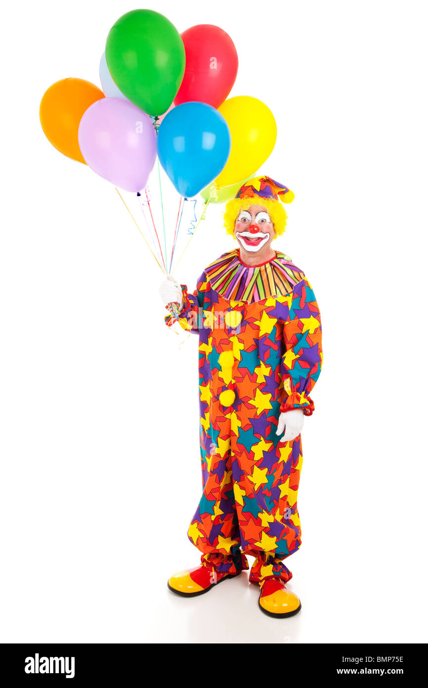 Full body isolated view of a happy clown holding a bunch of colorful ...