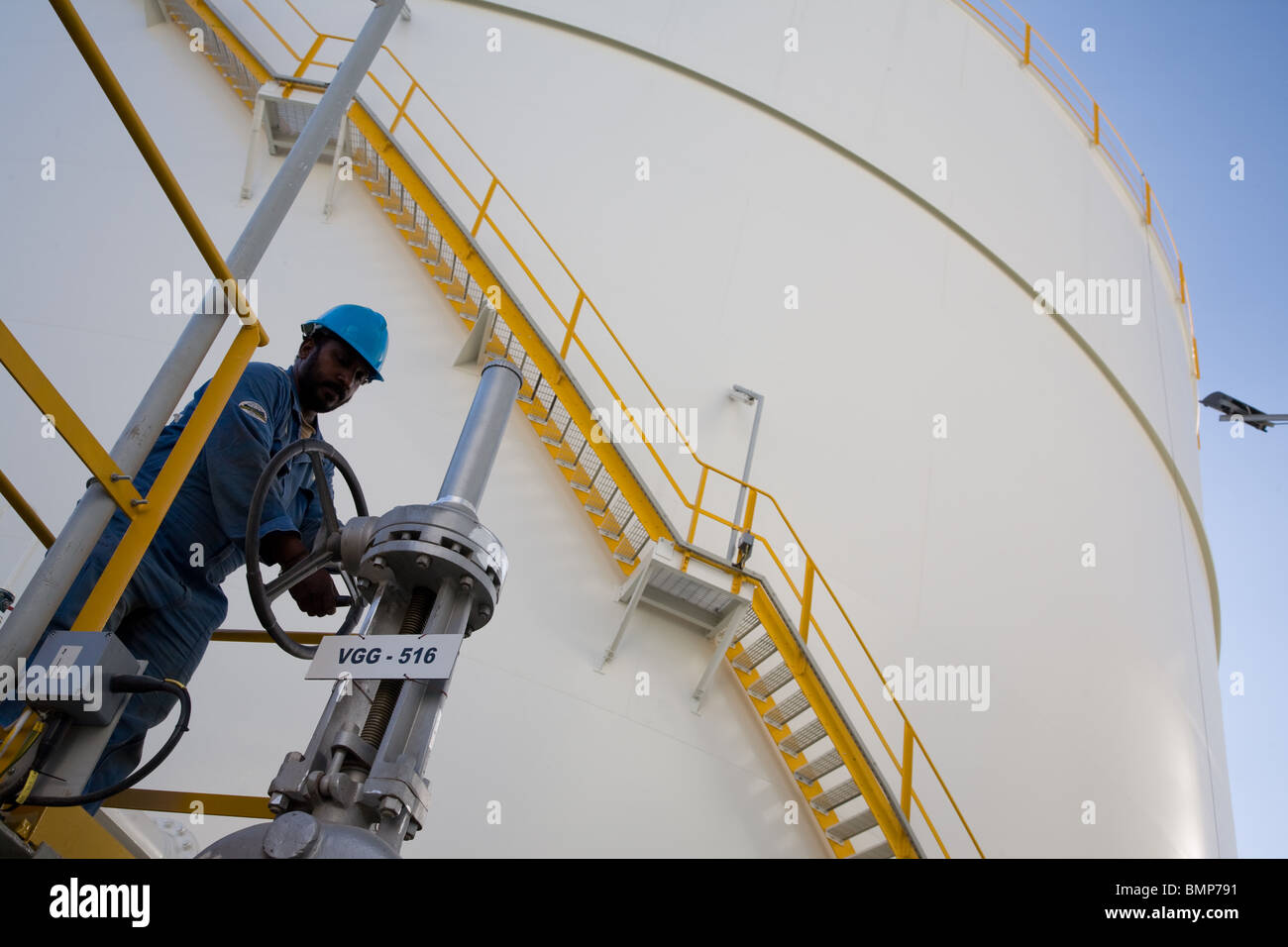 petrochemical oil storage tank farm tanks pipes Stock Photo - Alamy