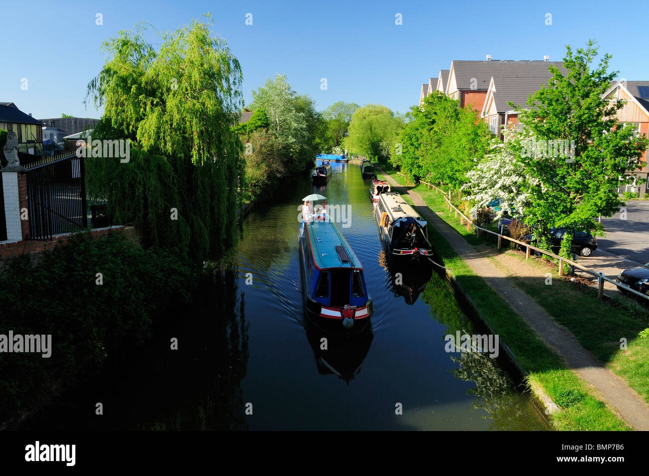 Narrowboat approaching bridge hi-res stock photography and images - Alamy