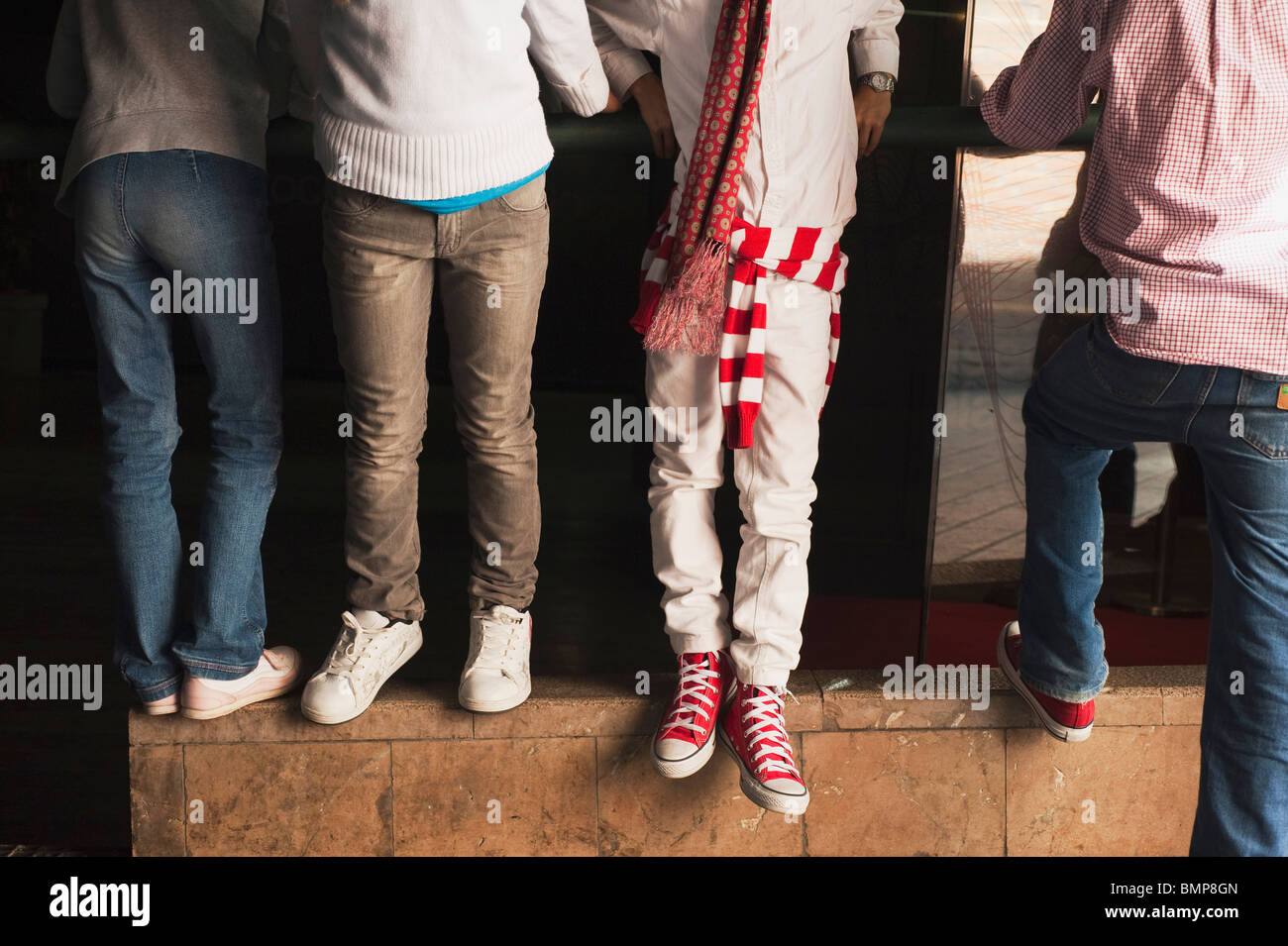 Legs Of Children Standing Together Stock Photo - Alamy