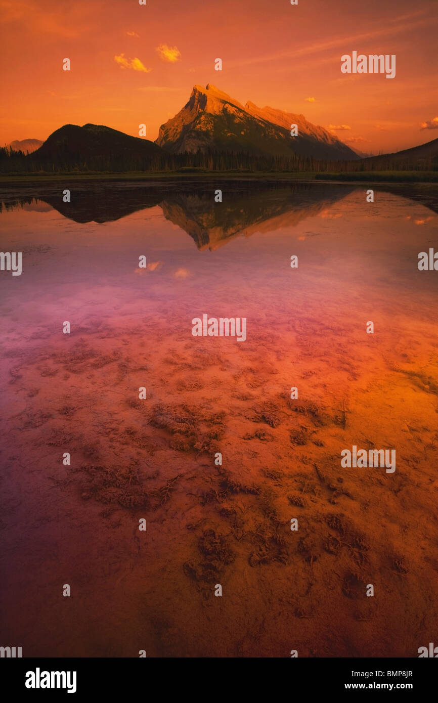 Banff, Alberta, Canada; A Mountain Lake And Mountains At Sunset Stock ...