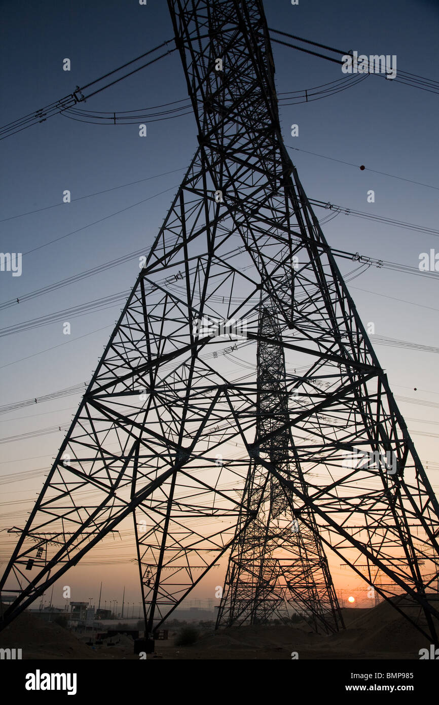 Transmission lines towers tower pylon power line Stock Photo - Alamy