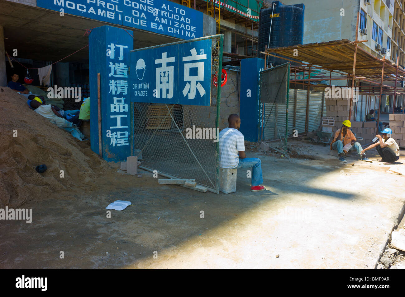 African workers on a chinese construction site in Maputo, Mozambique ...