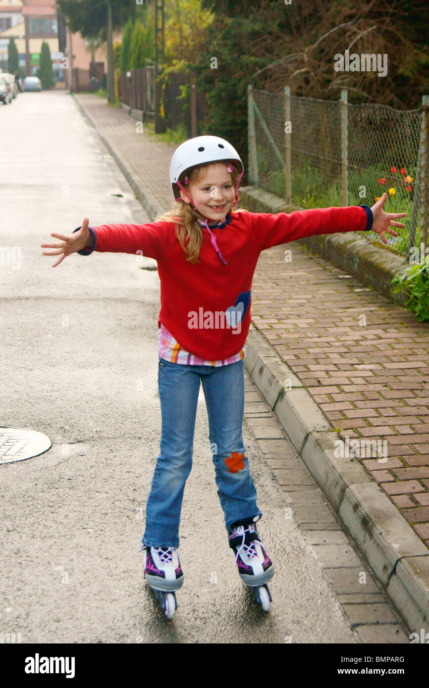 Girl on rollerblades Stock Photo - Alamy