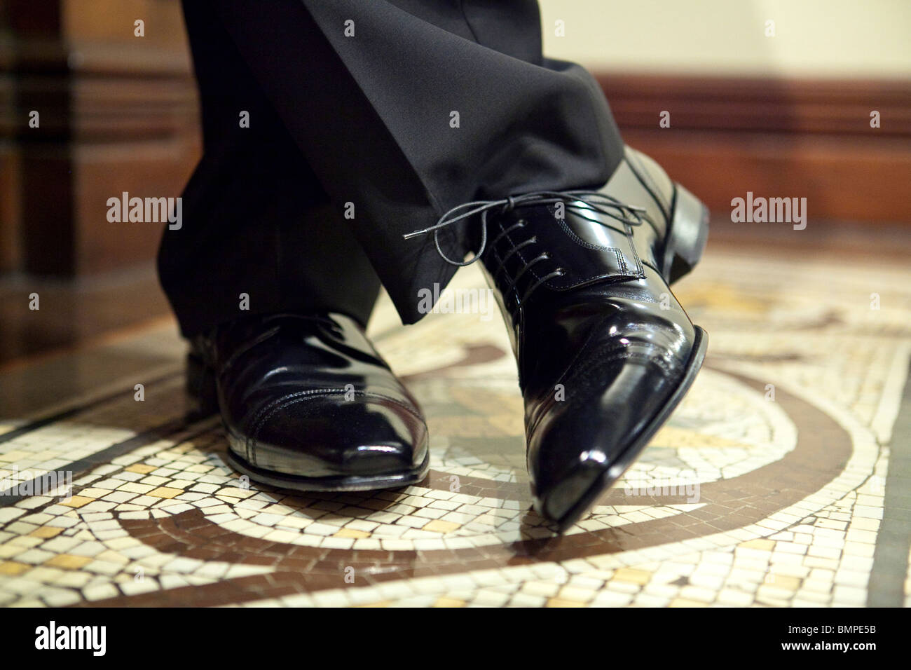 Man with polished leather shoes Stock Photo - Alamy