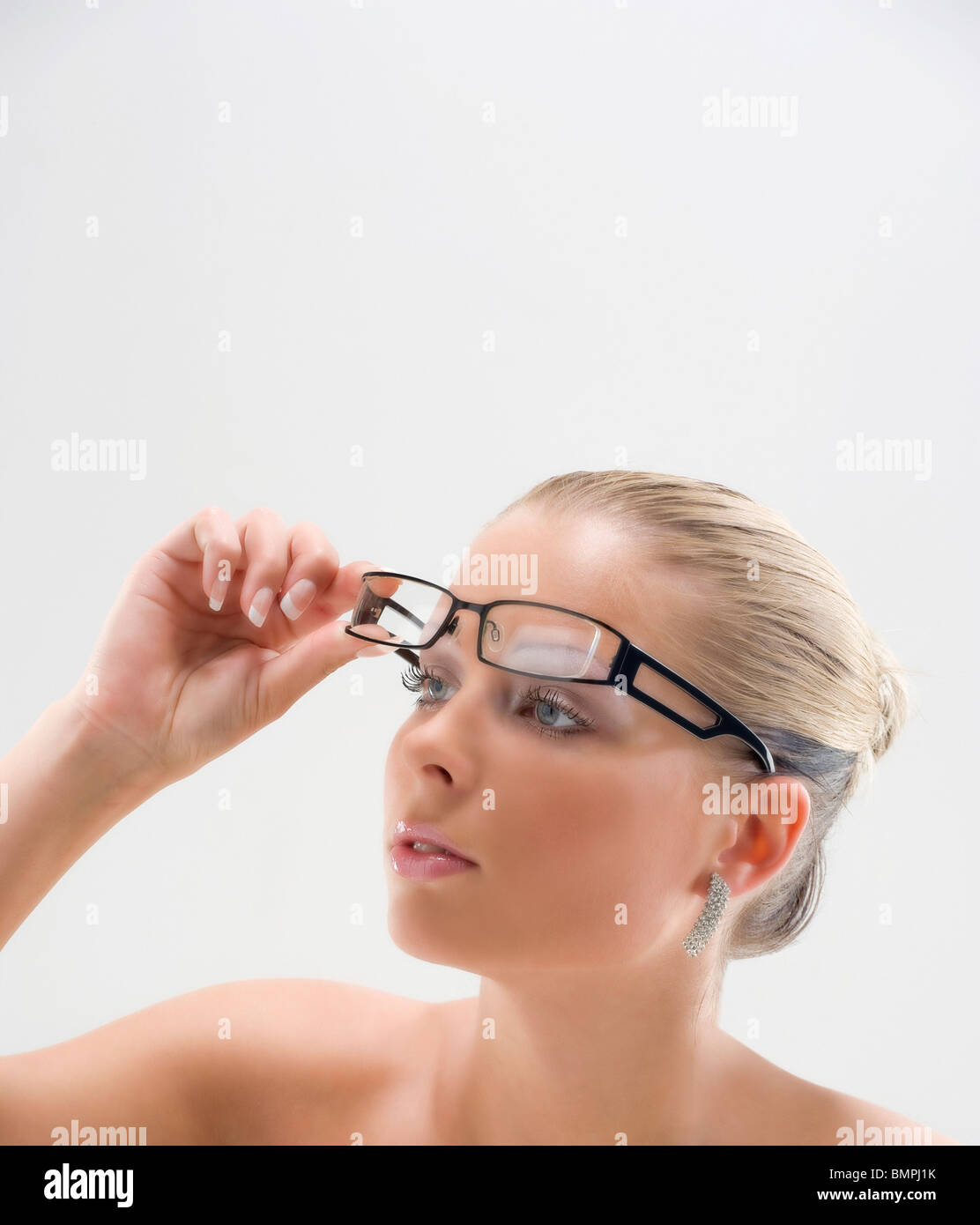 girl wearing spectacles on her head,model Stock Photo - Alamy