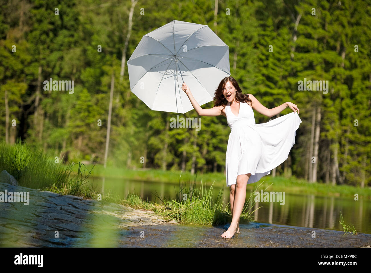 Woman wearing dress in water hi-res stock photography and images - Alamy