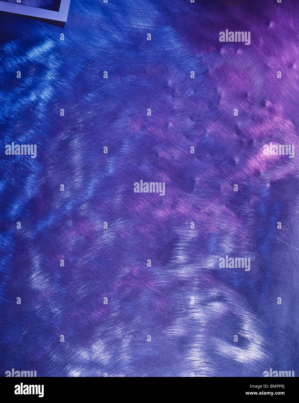 Blue patterned abrasions on metal slab Stock Photo - Alamy