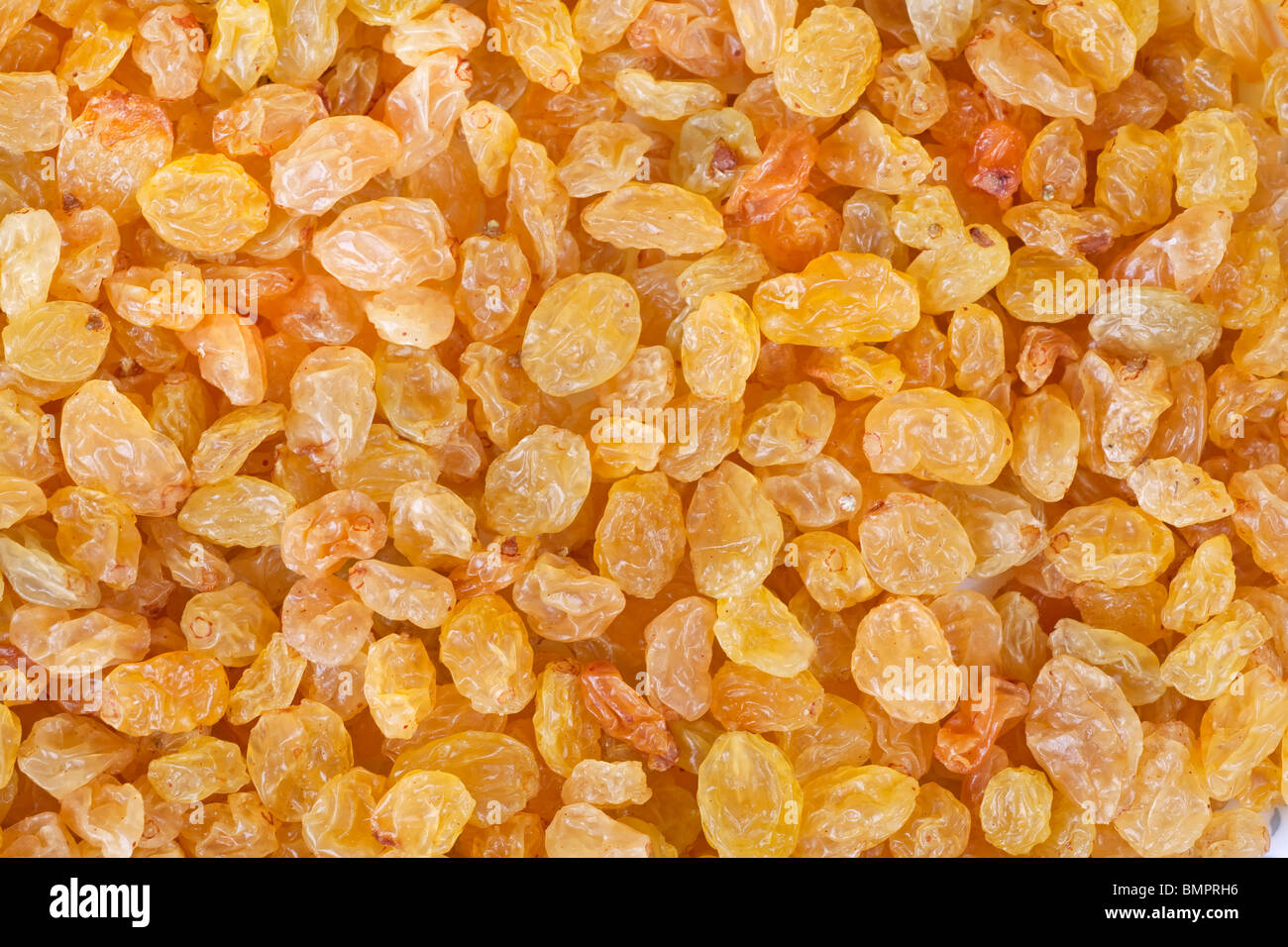 Dried raisin background texture Stock Photo - Alamy