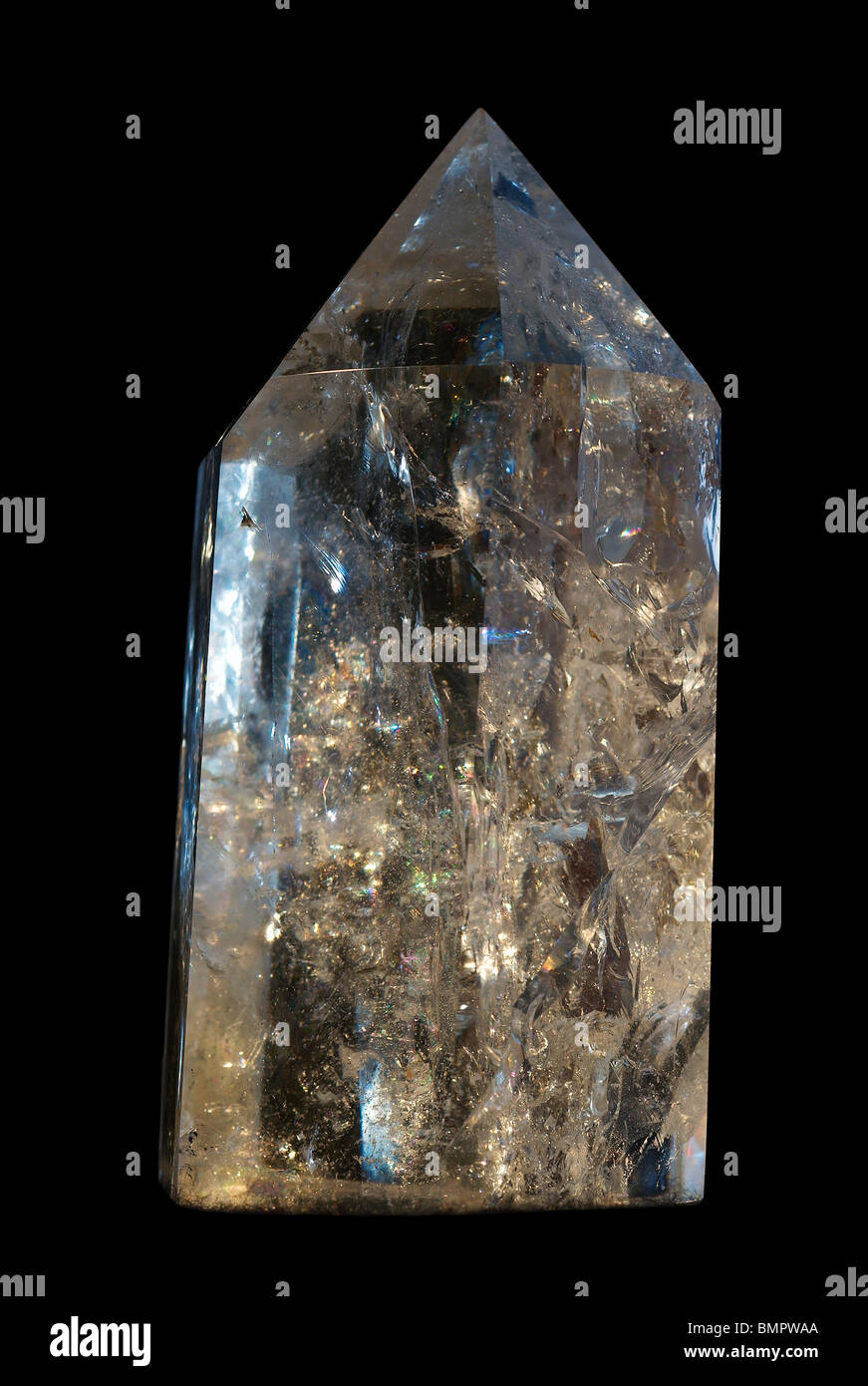 Large quartz crystal on black background Stock Photo - Alamy