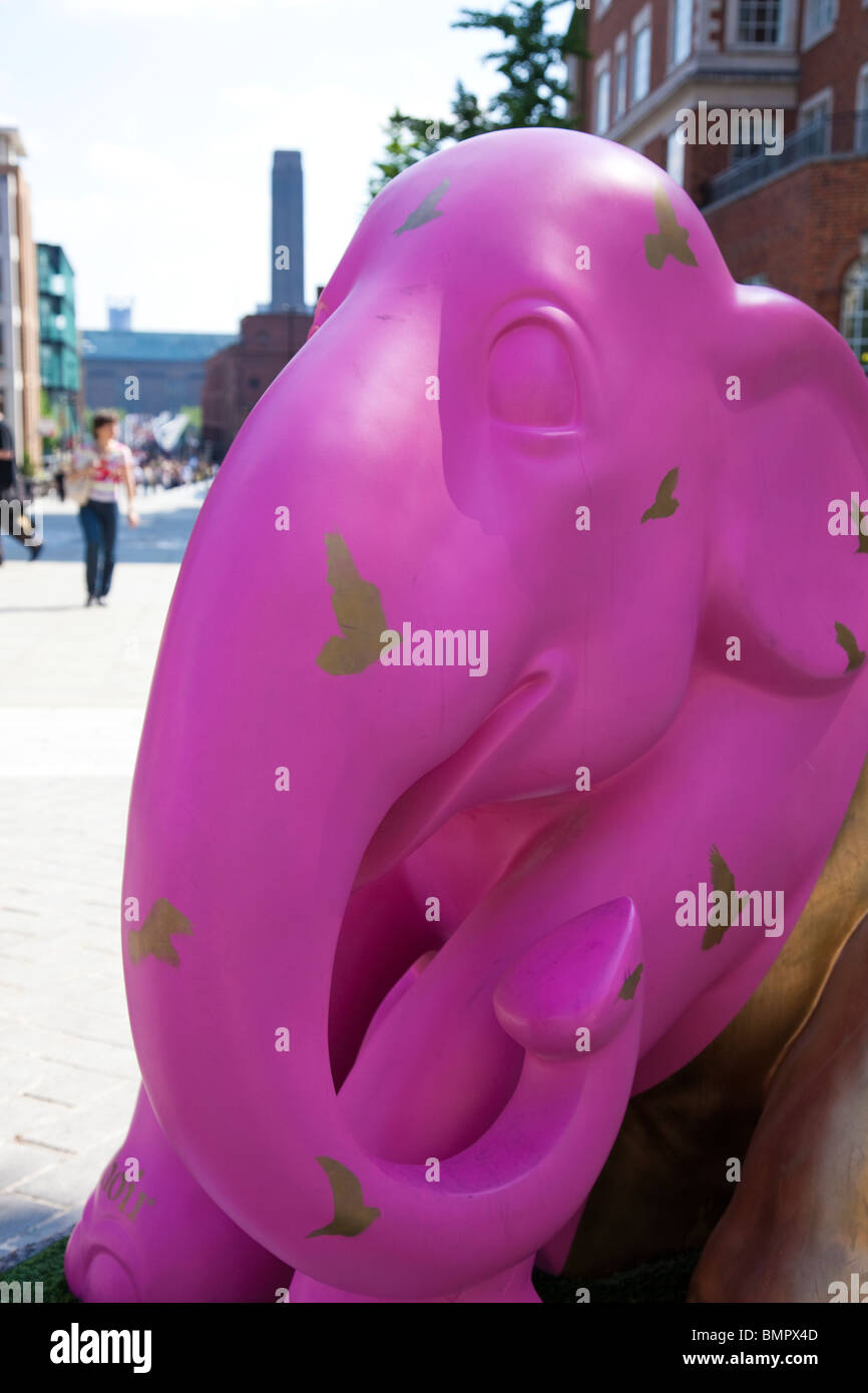 Pink Elephant with Tate Modern in background, London, UK. Part of ...