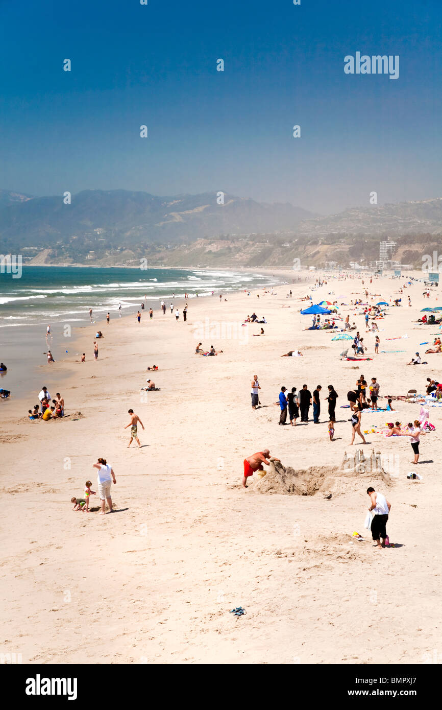 Santa Monica Beach with swimmers and people sunbathing, Los Angeles ...