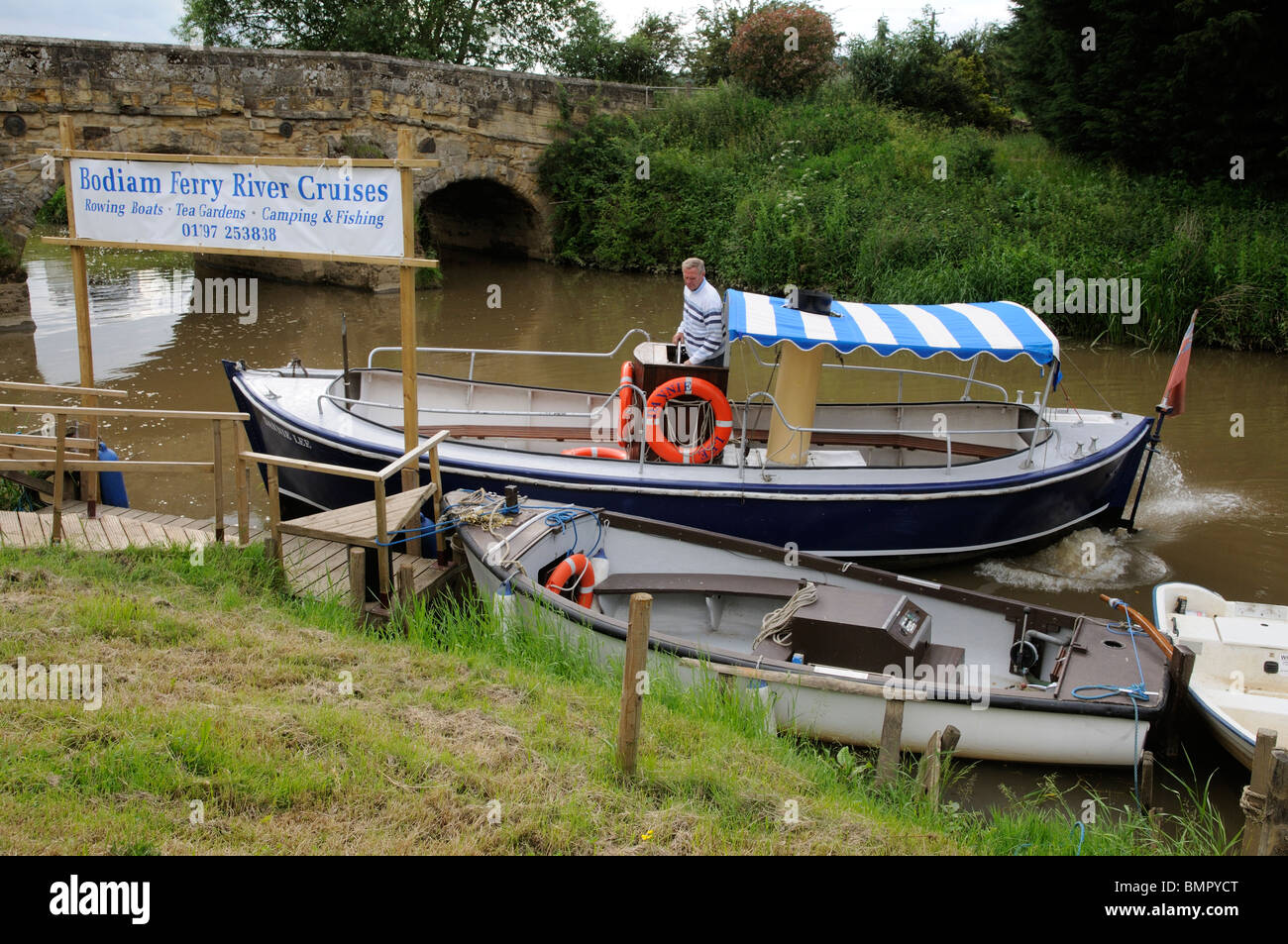Hire boats alongside on the River Rother & the Bodiam passenger ferry ...