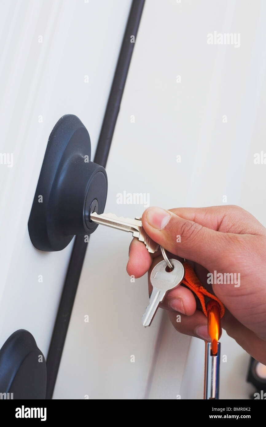 Knoxville, Tennessee, United States Of America; Putting Keys Into A ...