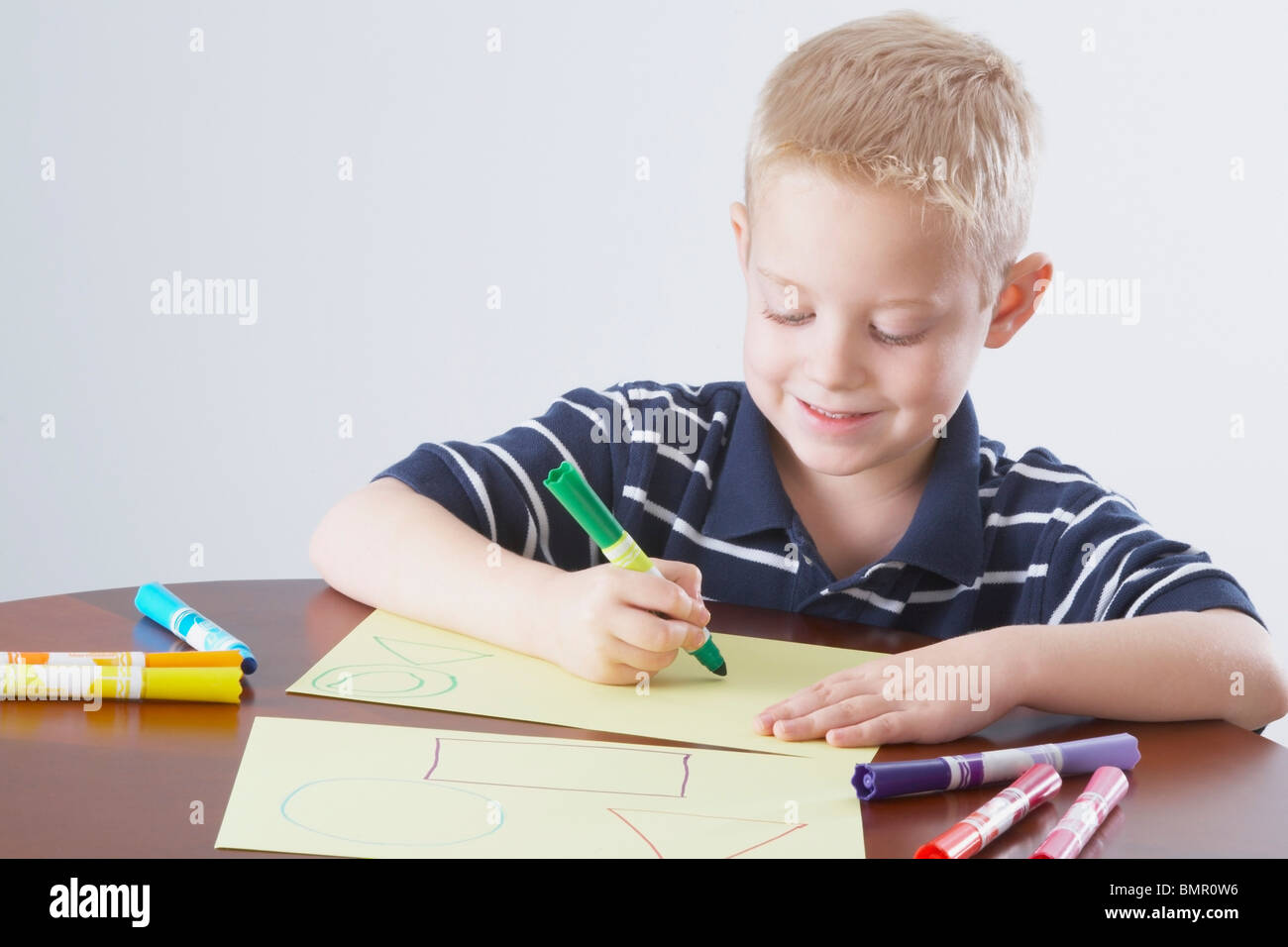 Knoxville, Tennessee, United States Of America; A Boy Coloring At A ...