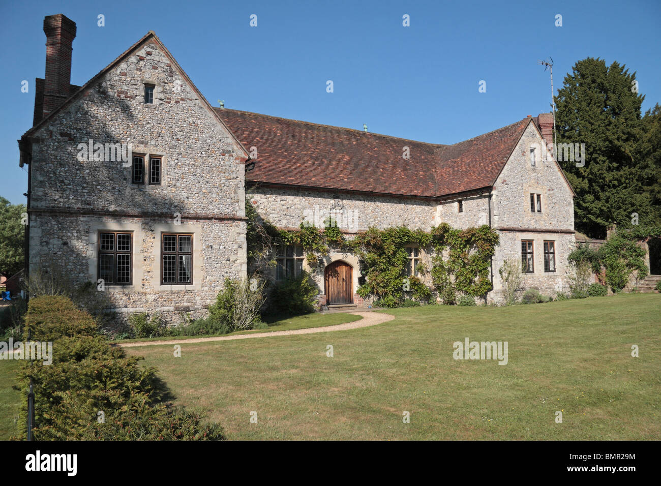 Traditional stone built house on the Chawton House Library estate ...