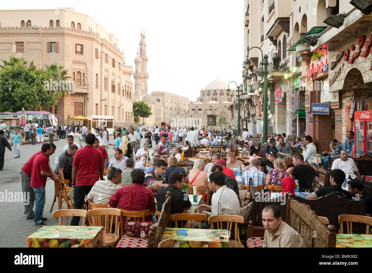 People congregating in the restaurants and cafes of the Islamic quarter ...