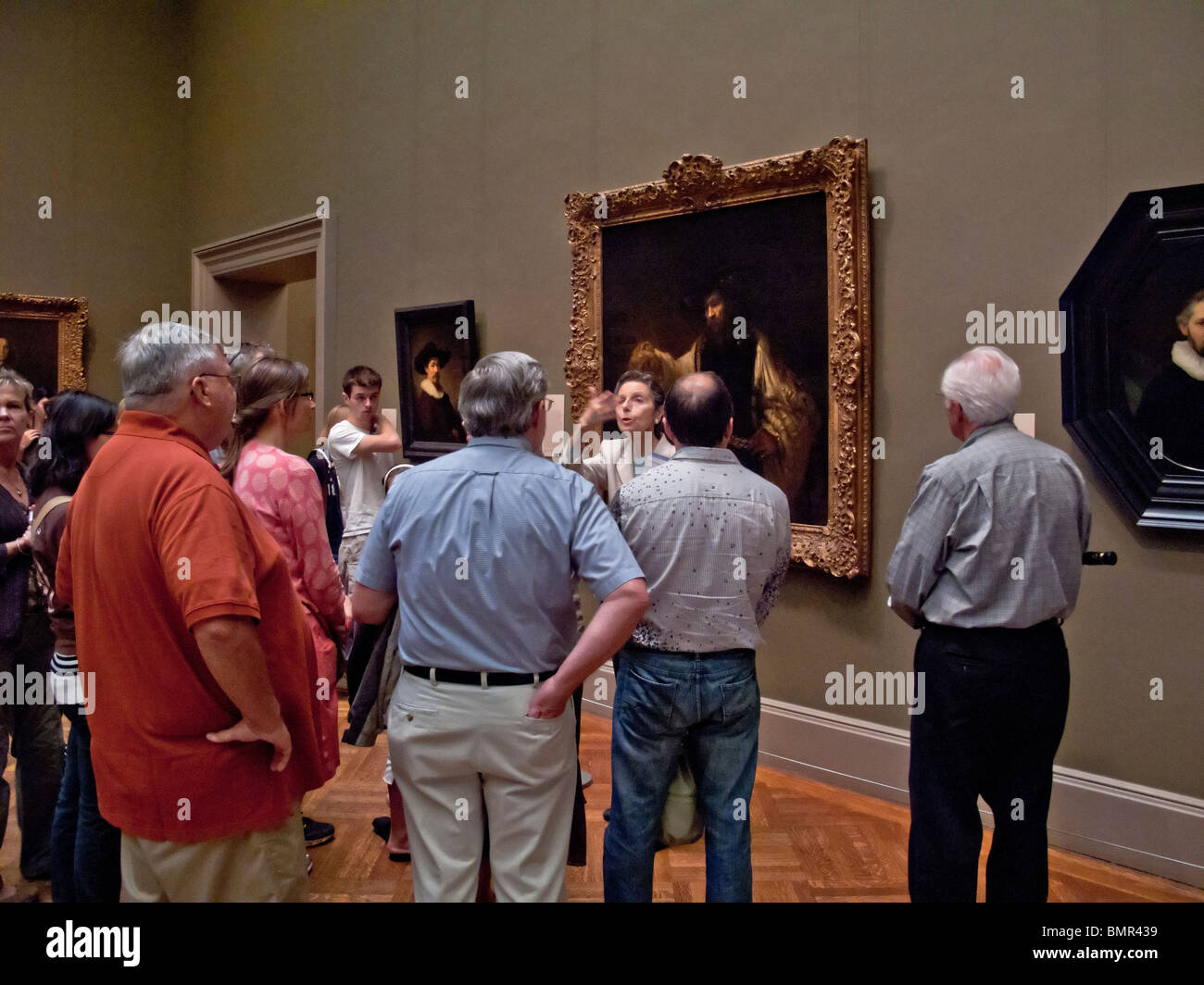 A guide at New York's Metropolitan Museum of Art describes Rembrandt 's ...