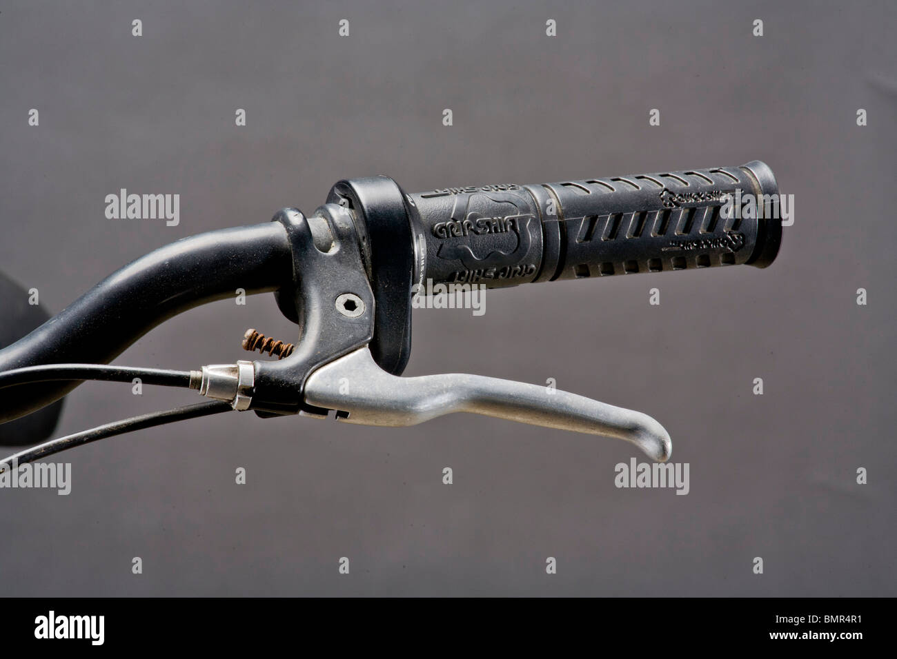 The brake and gear shift handles of a trail bicycle are connected to ...