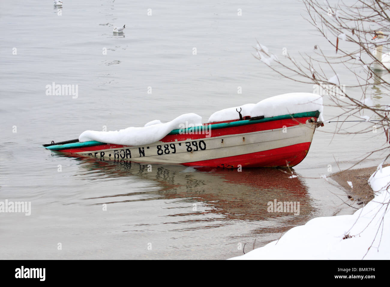 Snow covered boat Stock Photo - Alamy