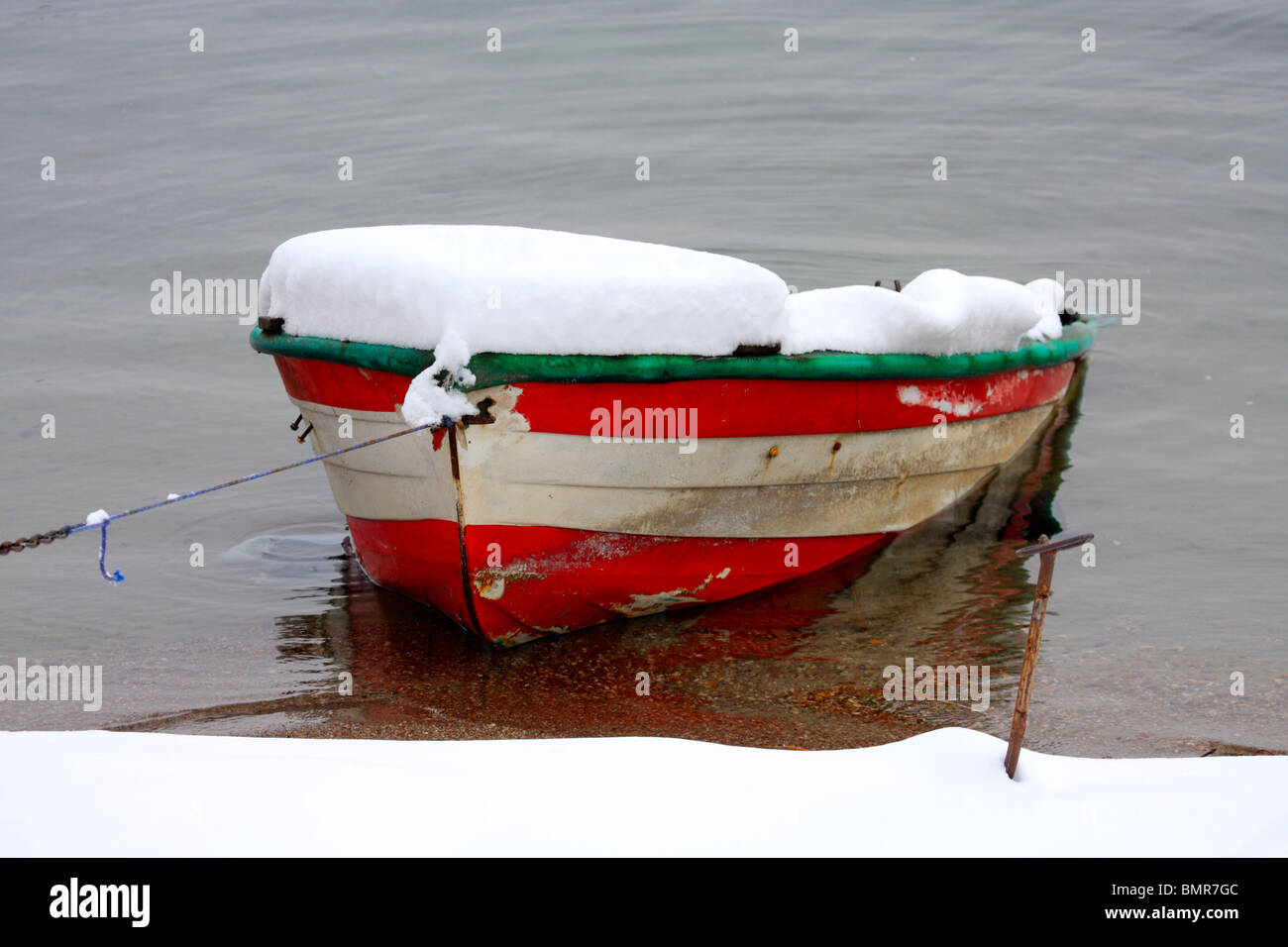 Snow covered boat Stock Photo - Alamy