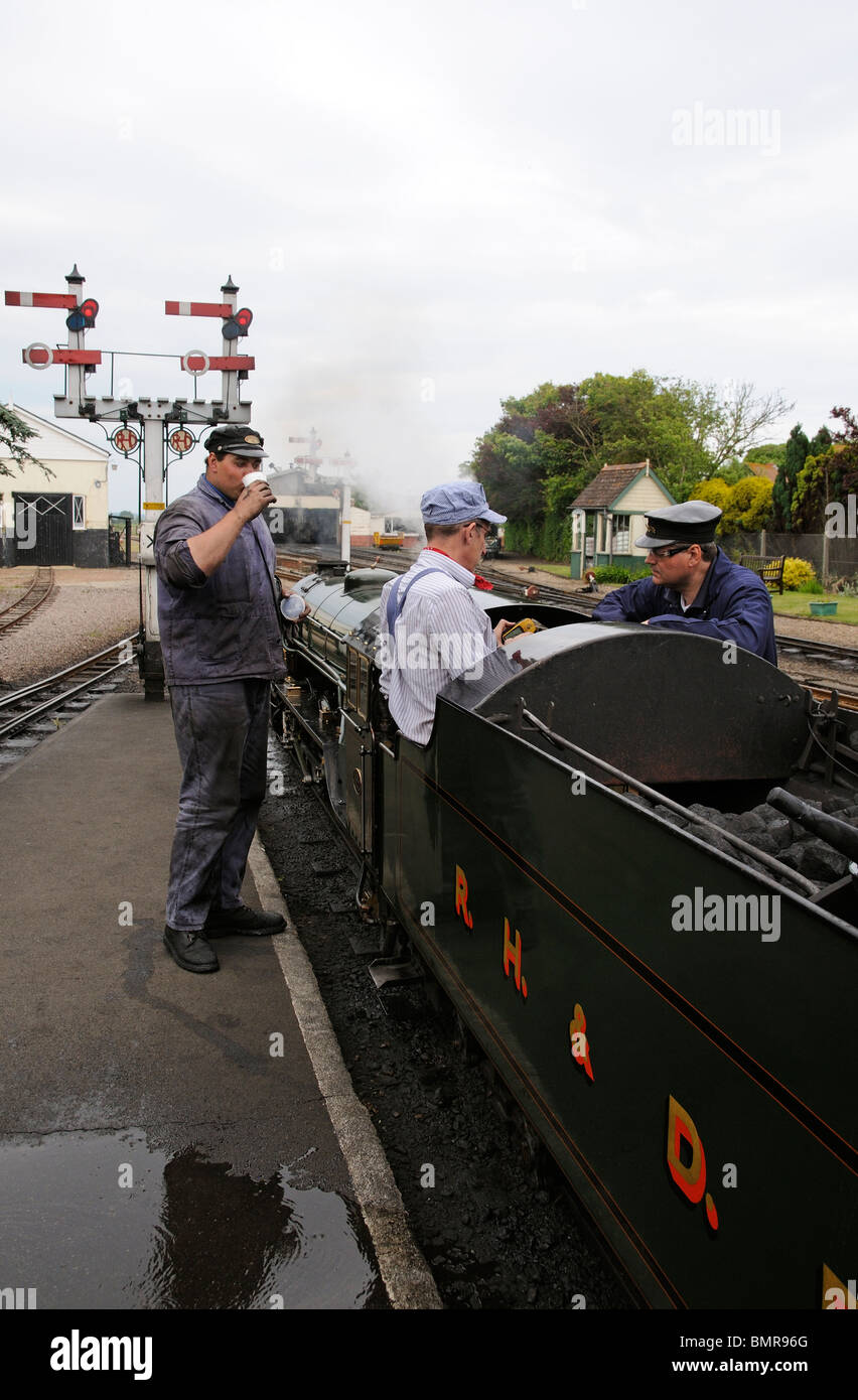 Engine driver and fireman of the Northern Chief steam engine prepare to ...