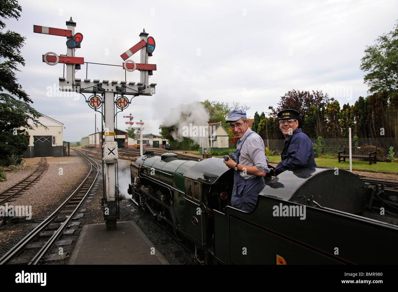 Engine driver and fireman of the Northern Chief steam engine prepare to ...