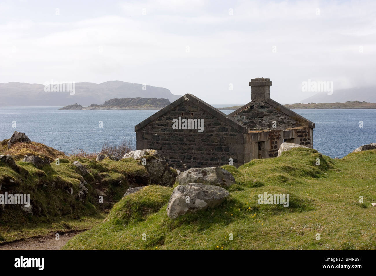 The old pier and building at Aird on the Craignish Peninsula Argyll ...