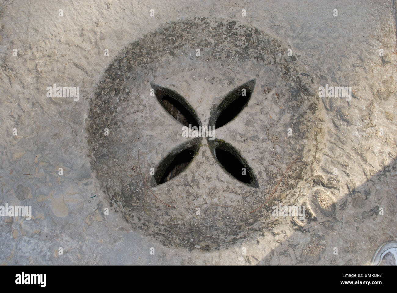Drainage cover outside the Amphitheatre, Italica, Seville, Seville ...