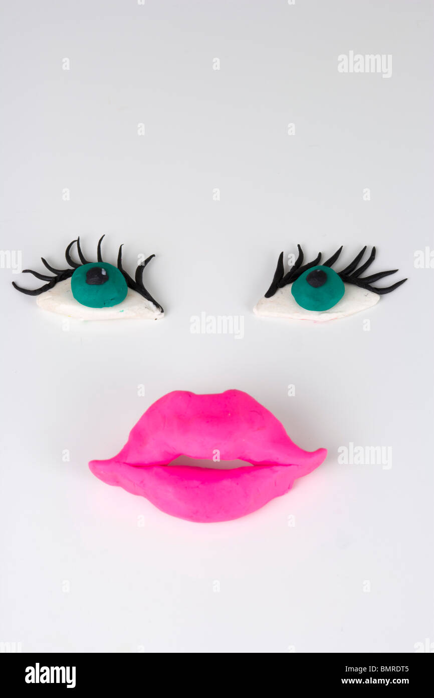 Plasticine figurines, Female face, eyes and lips Stock Photo - Alamy