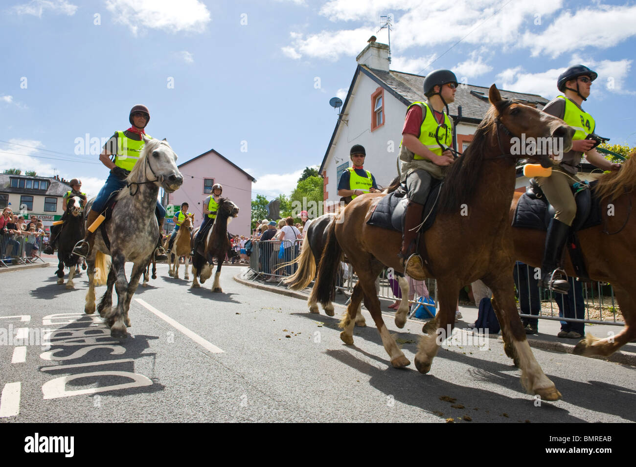Man and woman riding horses hi-res stock photography and images - Alamy