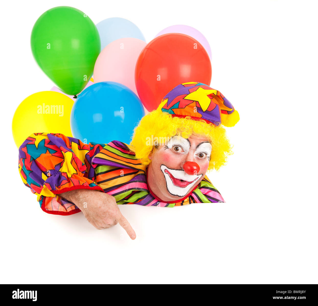 Pointing clown with balloons, isolated on white. Design element ready ...