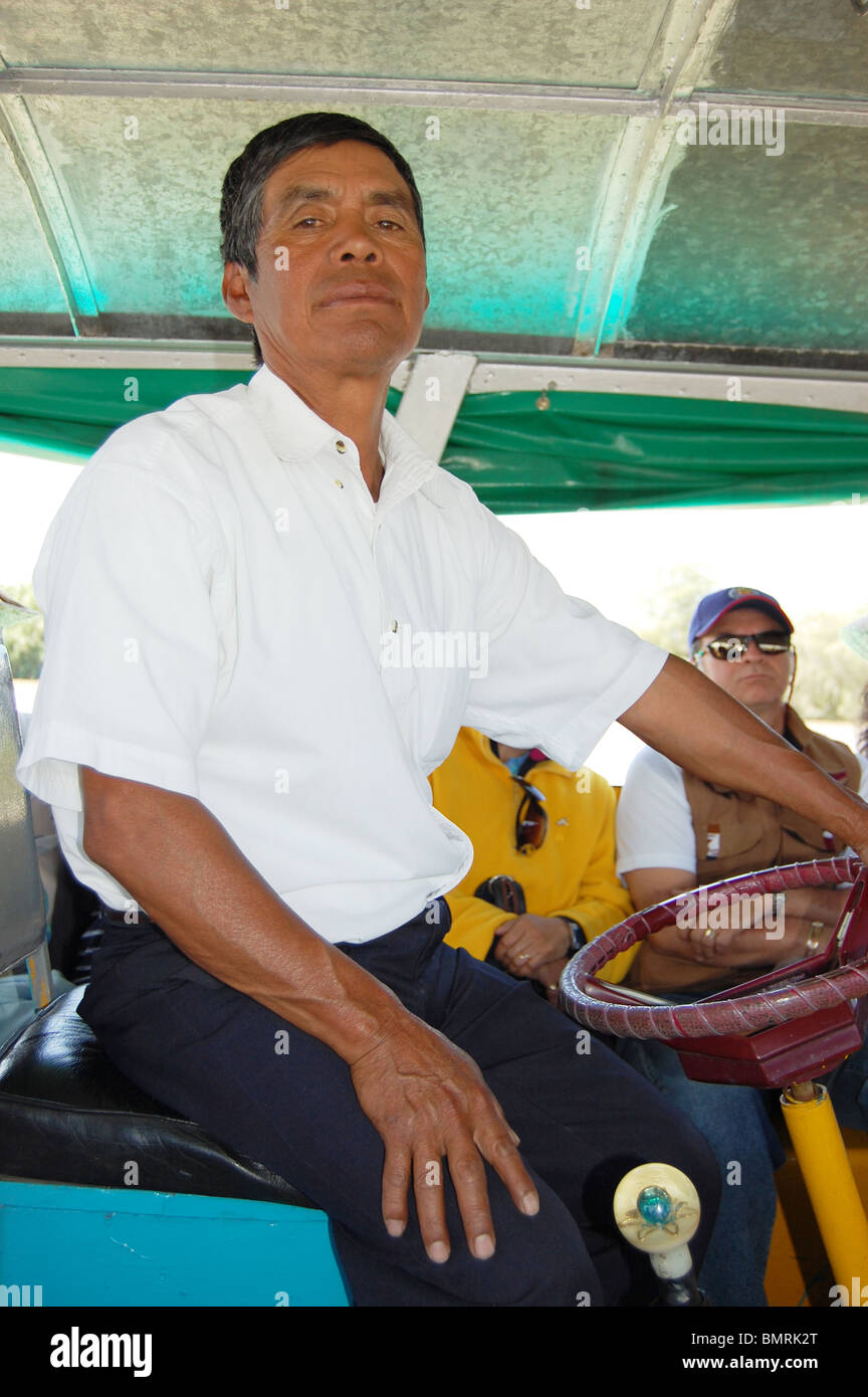 Boat captain in lake Patzcuaro Stock Photo - Alamy