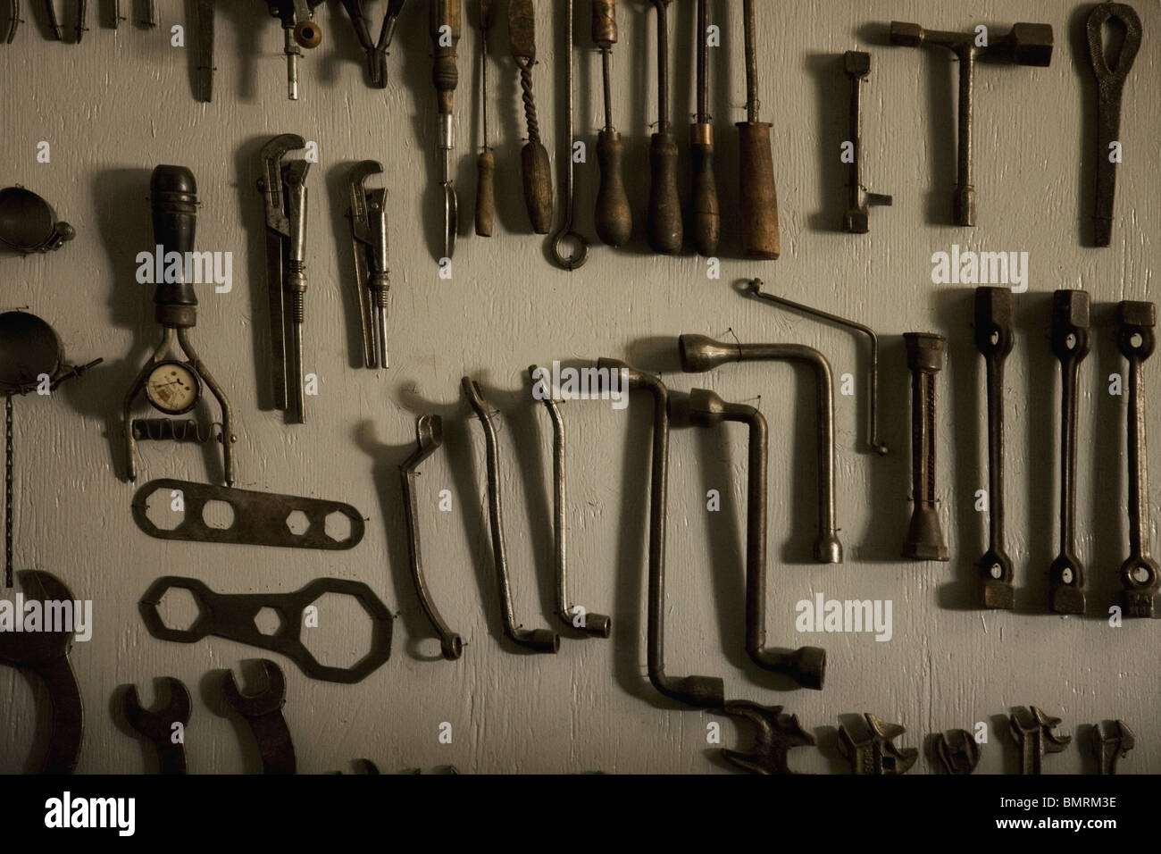 Alberta, Canada; Old Tools Hanging On The Wall Stock Photo - Alamy