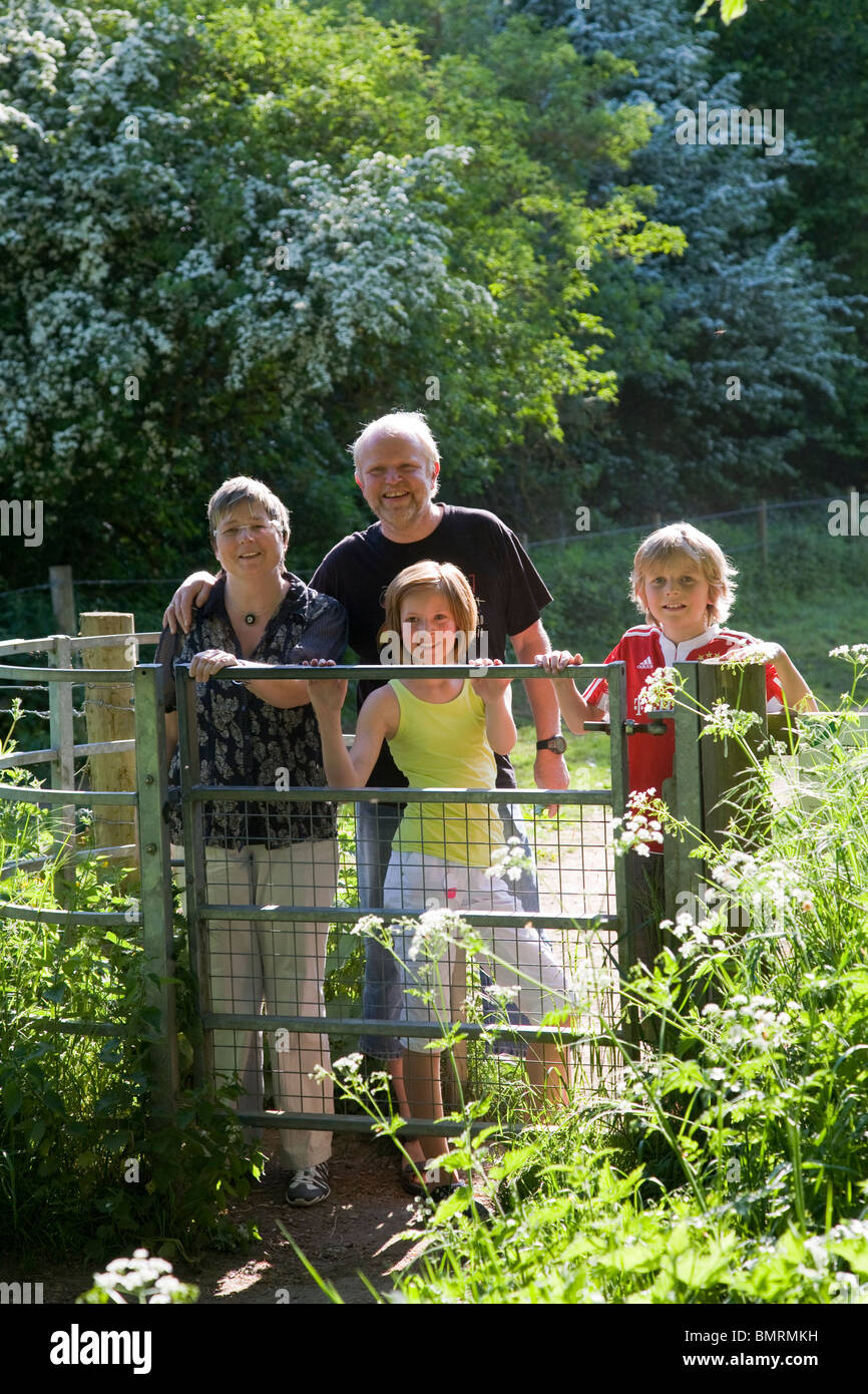Family going for a walk in the countryside Stock Photo - Alamy