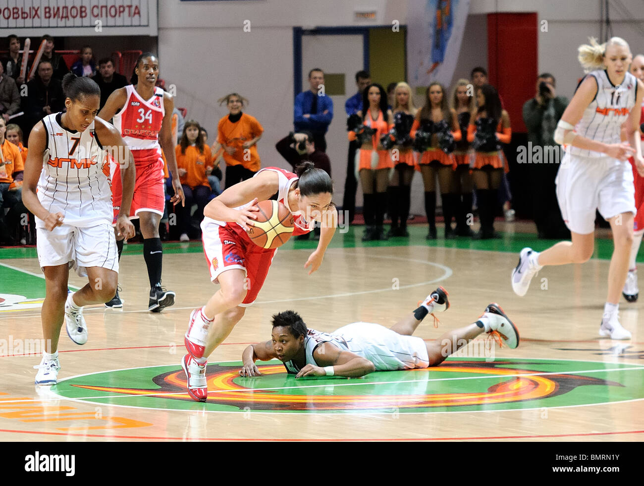 Sue Bird #10 run away from Sandrine Gruda #7 and Cappie Pondexter # 23 ...