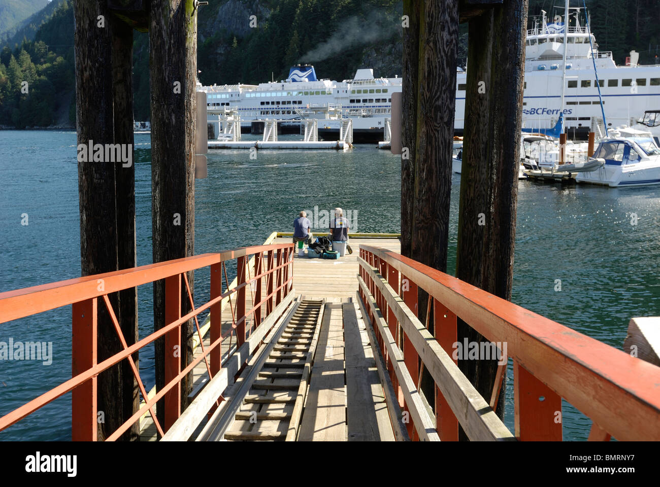 Men dock wharf pier ferries water hi-res stock photography and images ...