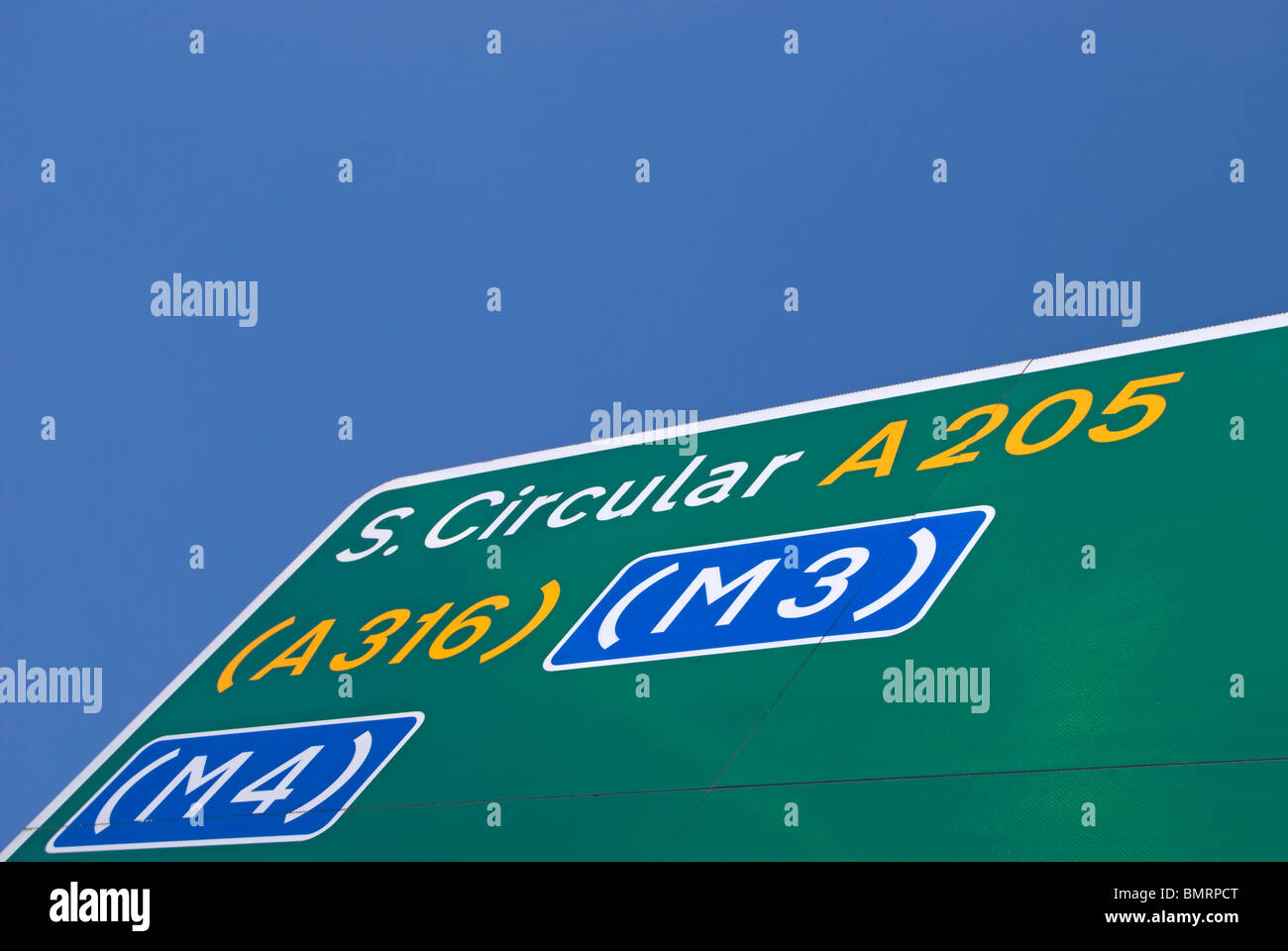 british road sign giving details for london's south circular and the ...
