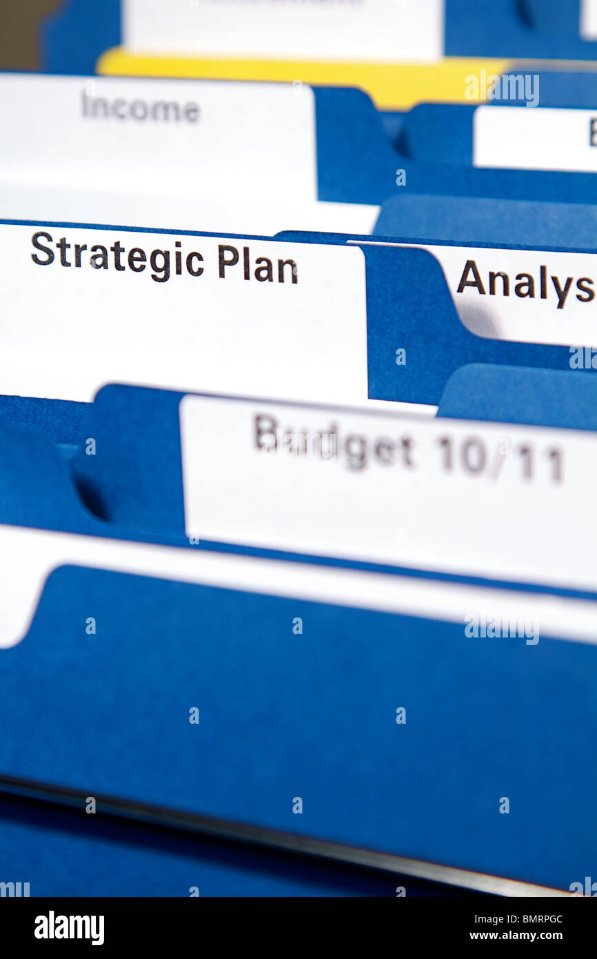 Filing cabinet full of business folders and documents Stock Photo - Alamy